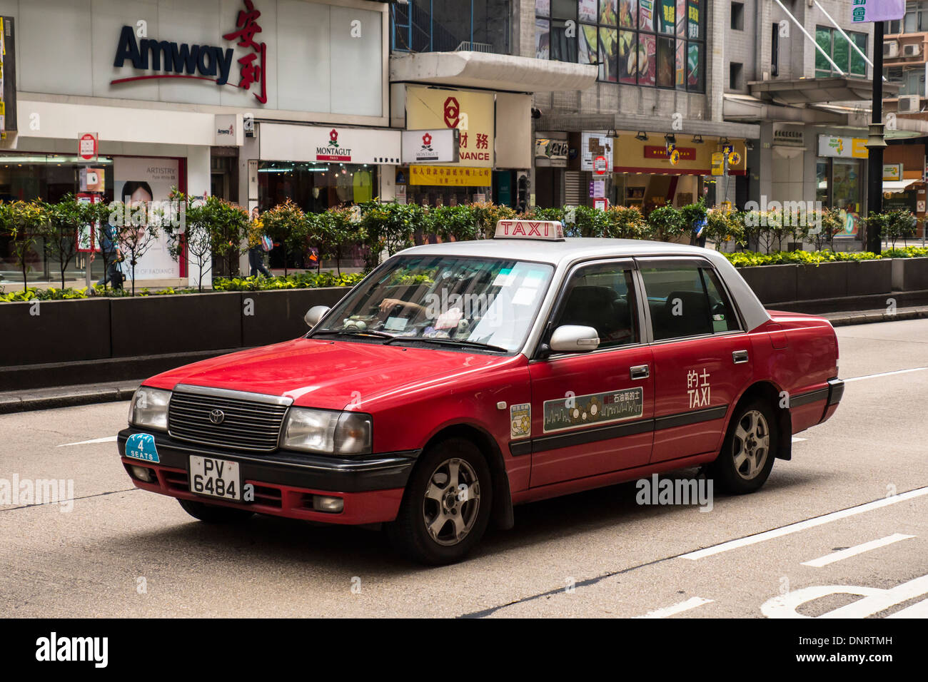 Hong kong taxi hi-res stock photography and images - Alamy