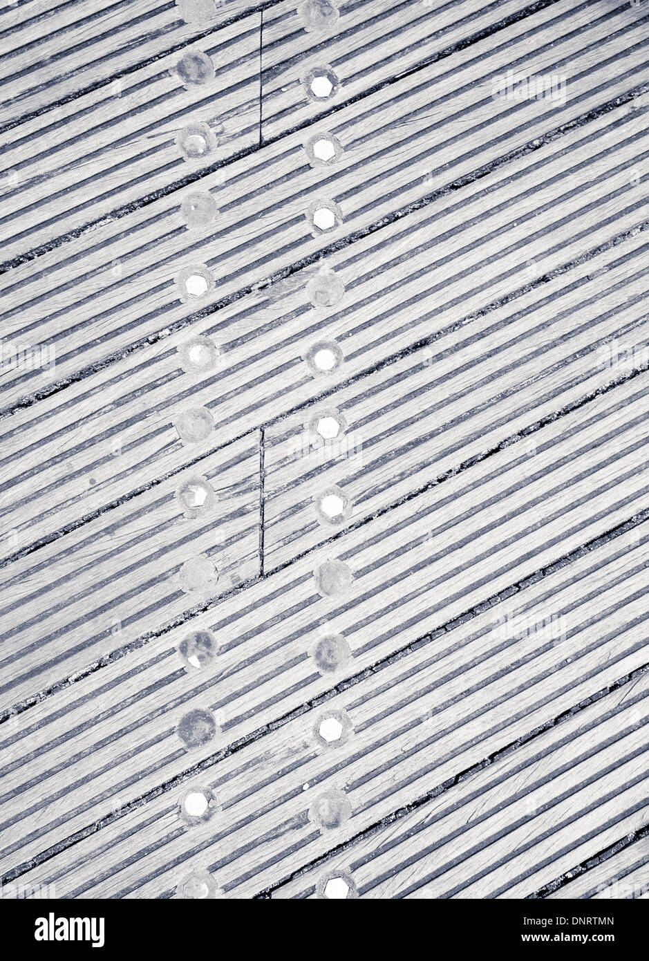 Detail of a wooden bridge with diagonal boards and nail line Stock ...