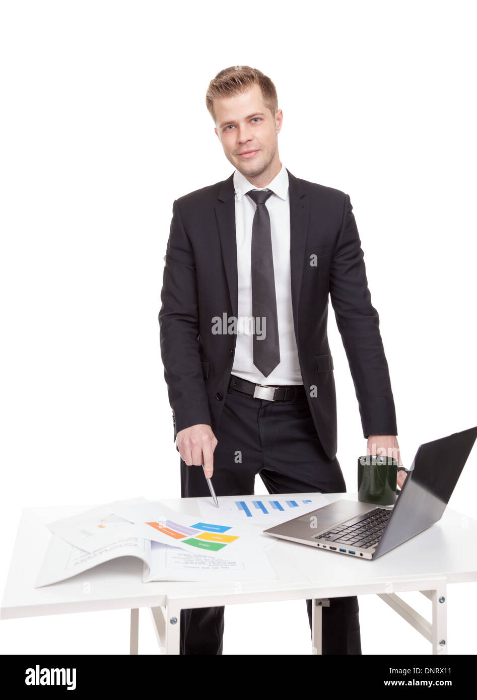 Standing working at desk Cut Out Stock Images & Pictures - Alamy