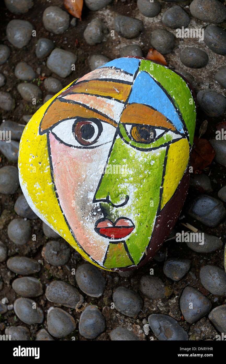 large stones with faces painted on Stock Photo - Alamy