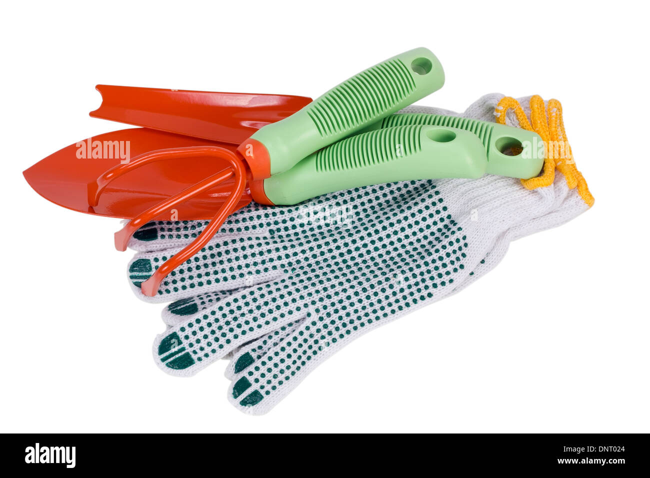 Green gloves and orange mass production garden hand tools isolated with ...