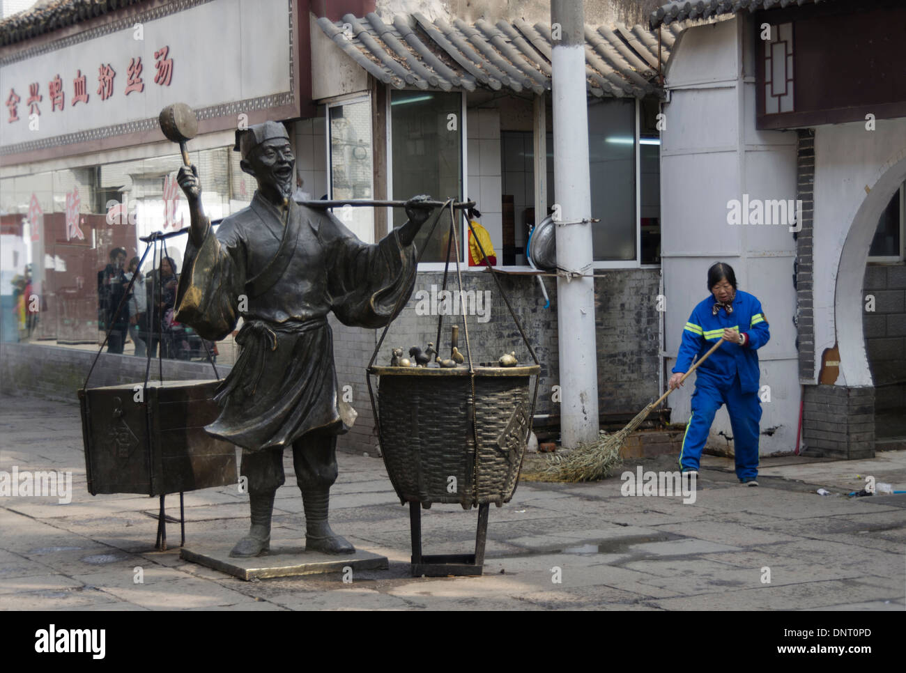 Street art in Nanjing China with street cleaner Stock Photo - Alamy