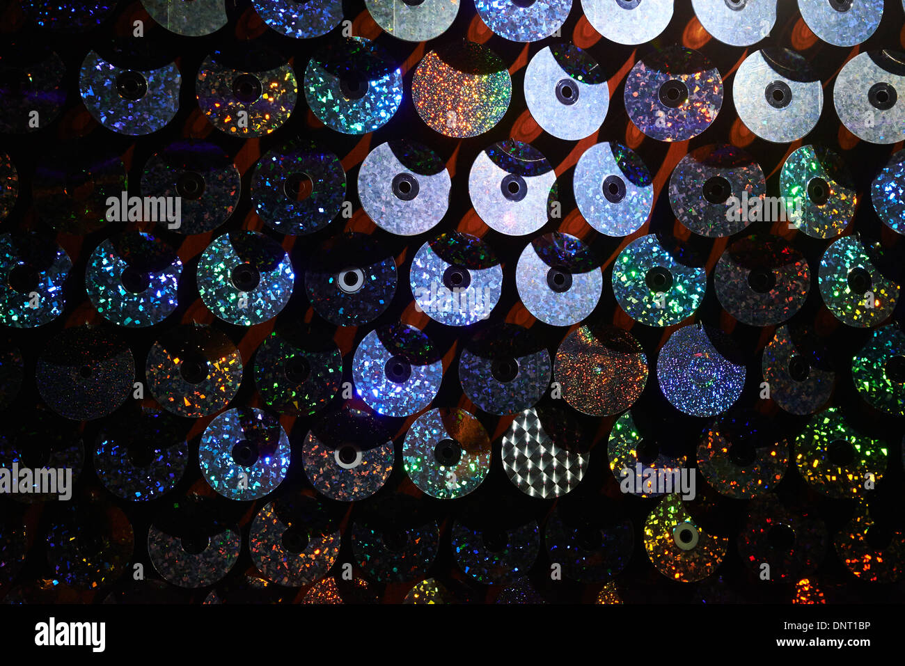 Compact discs piled up with reflection Stock Photo - Alamy