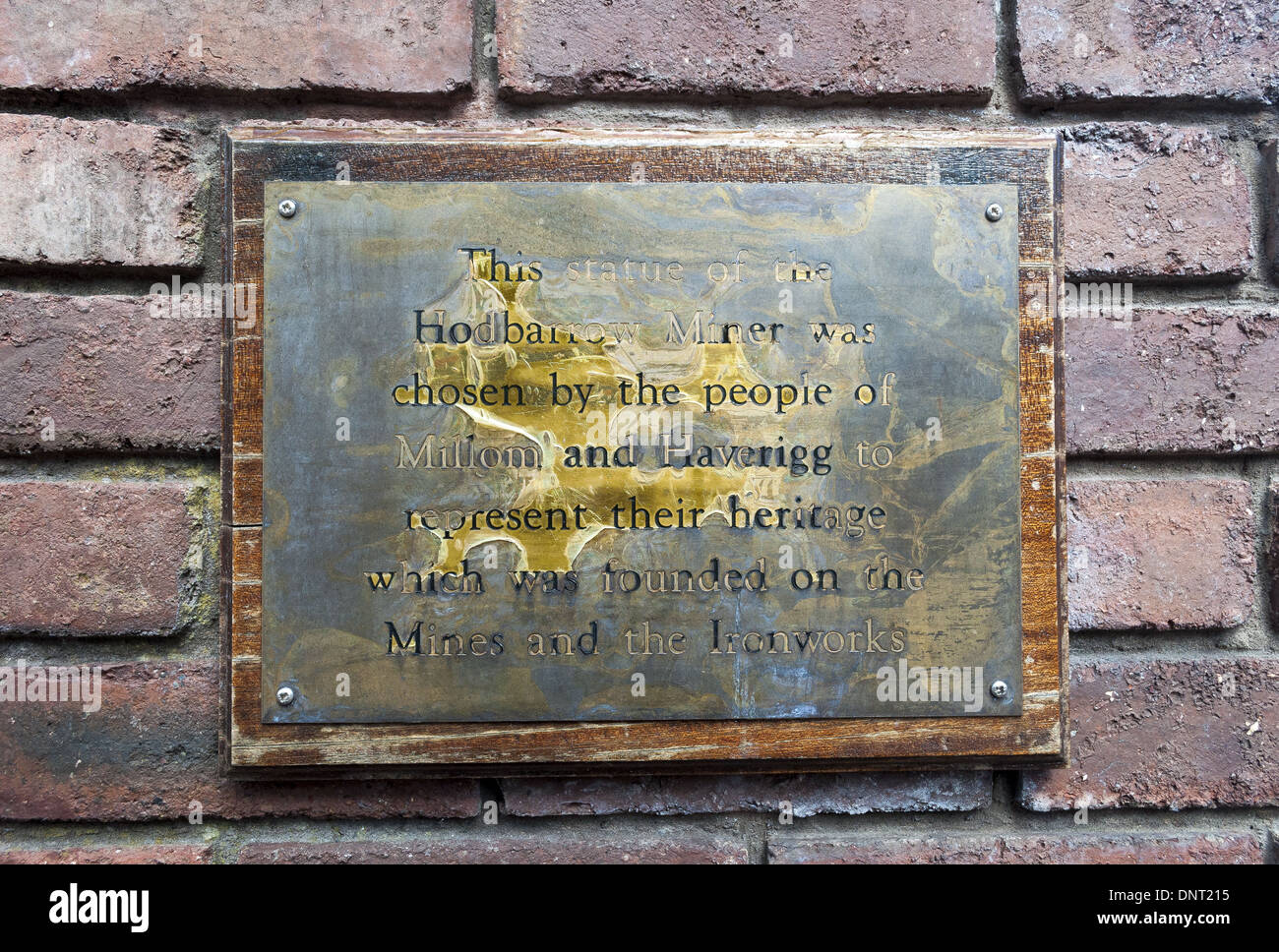 Brass plaque located below the statue of the Hodbarrow Miner, Market ...