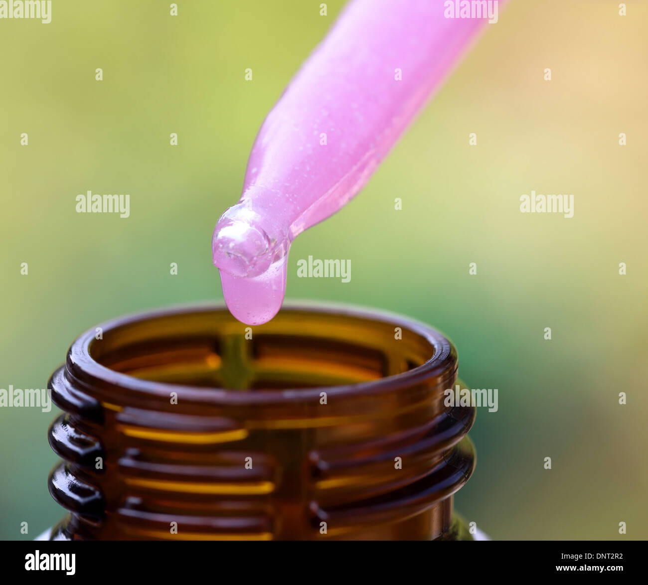 Liquid medicine pouring by drop from a dropper Stock Photo - Alamy