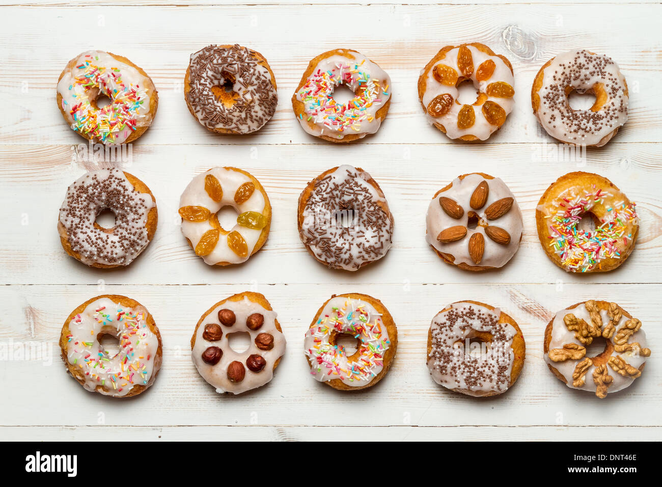 Group of colorfully decorated donuts Stock Photo - Alamy