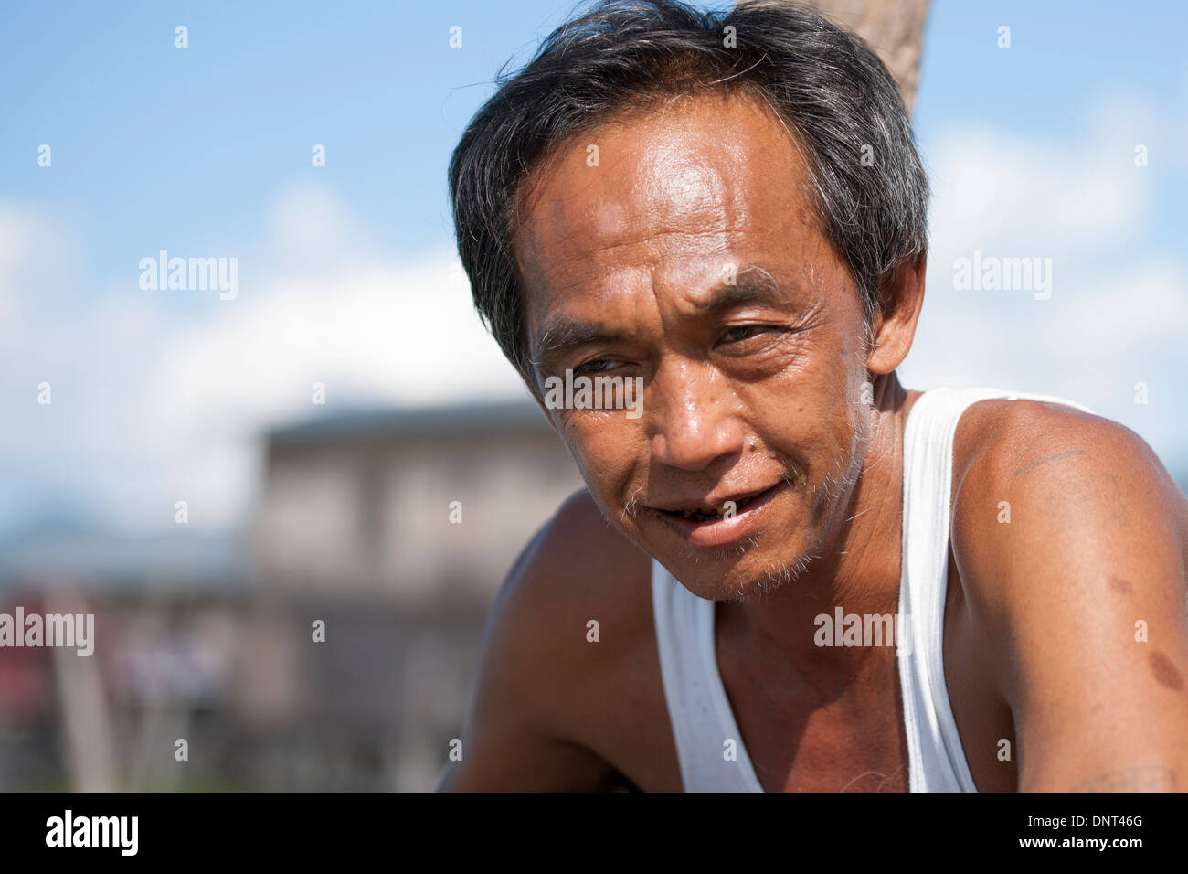 Single Cheerful Asian Senior Citizen Male Man portrait outdoors in a ...