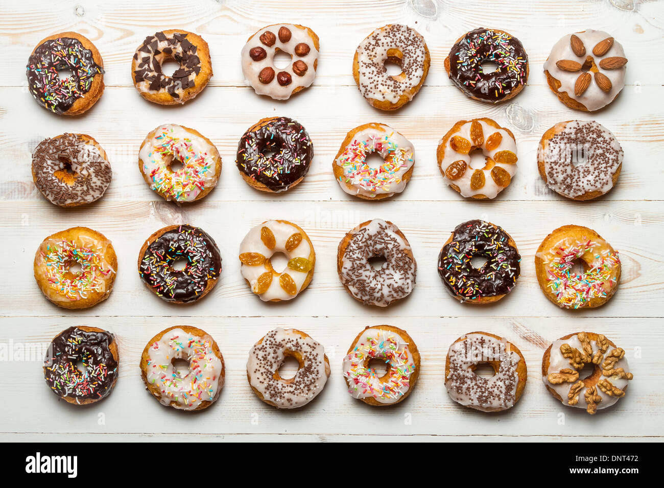 Large group of colorfully decorated donuts Stock Photo - Alamy