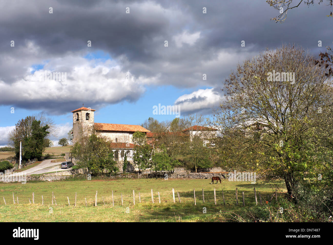 rural landscape with village on countryside with church. Alava, Basque ...