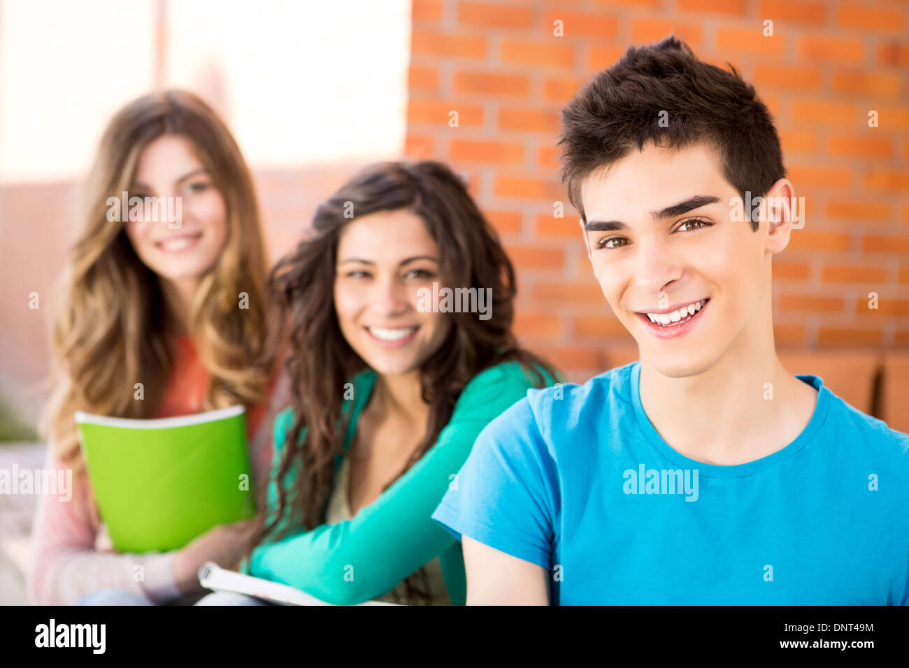 Young group of students in campus Stock Photo - Alamy
