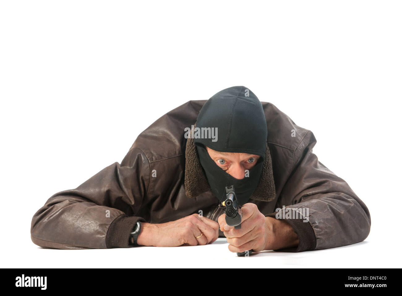 Sniper with gun in the studio with focal point on gun Stock Photo - Alamy