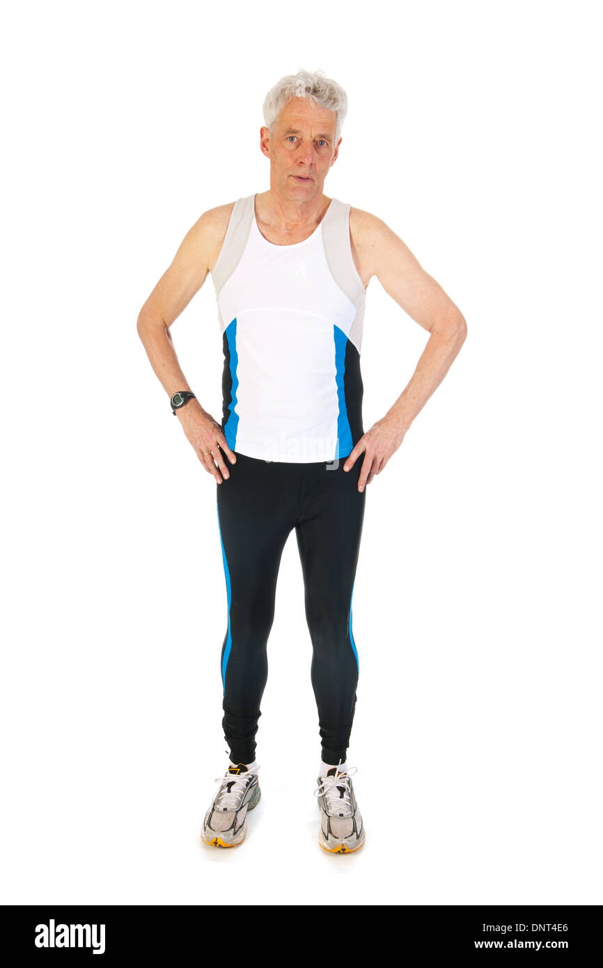Senior runner standing in studio isolated over white background Stock ...