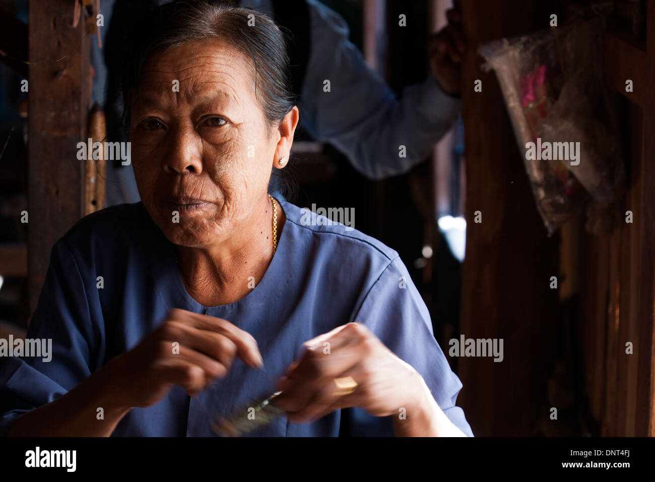 Woman dim light hi-res stock photography and images - Alamy