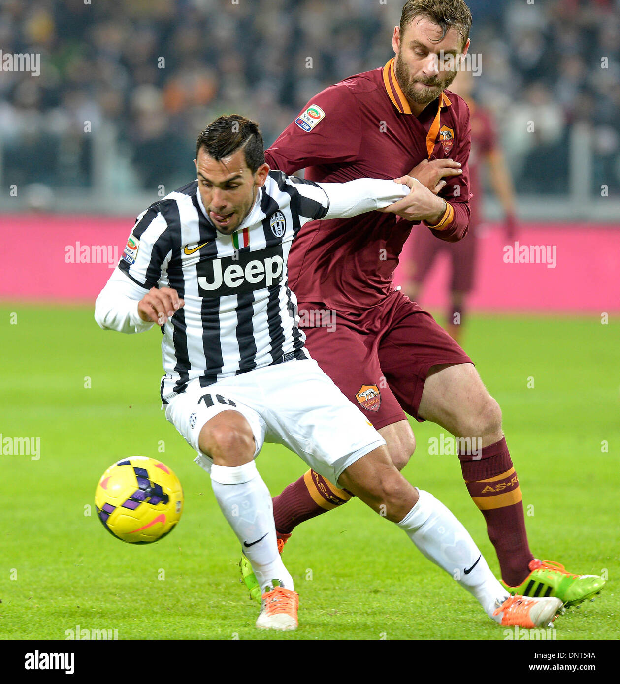 Torino, Italy. 5th Jan, 2014. Tevez and De Rossi during the Serie A ...
