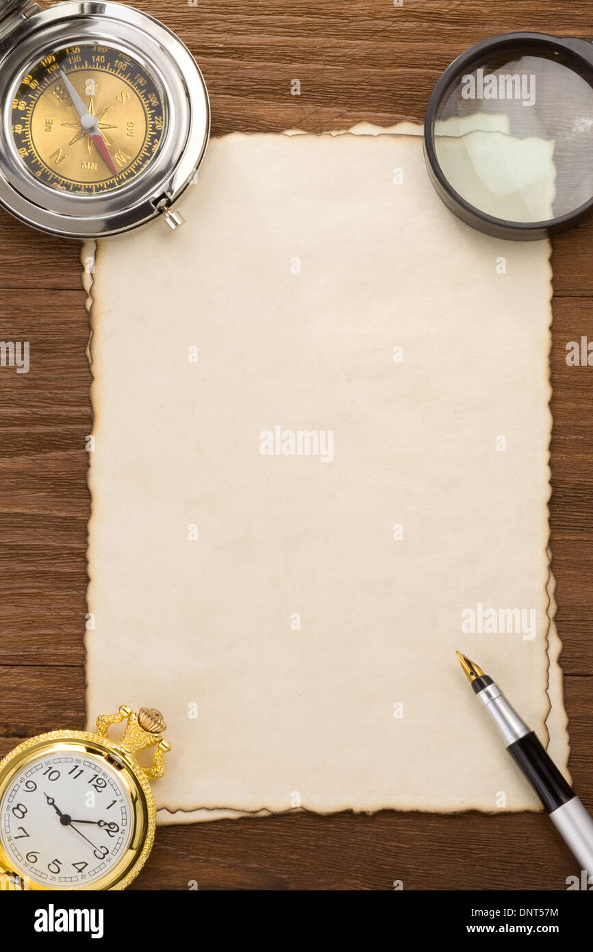 ink pen and compass on parchment background texture Stock Photo - Alamy