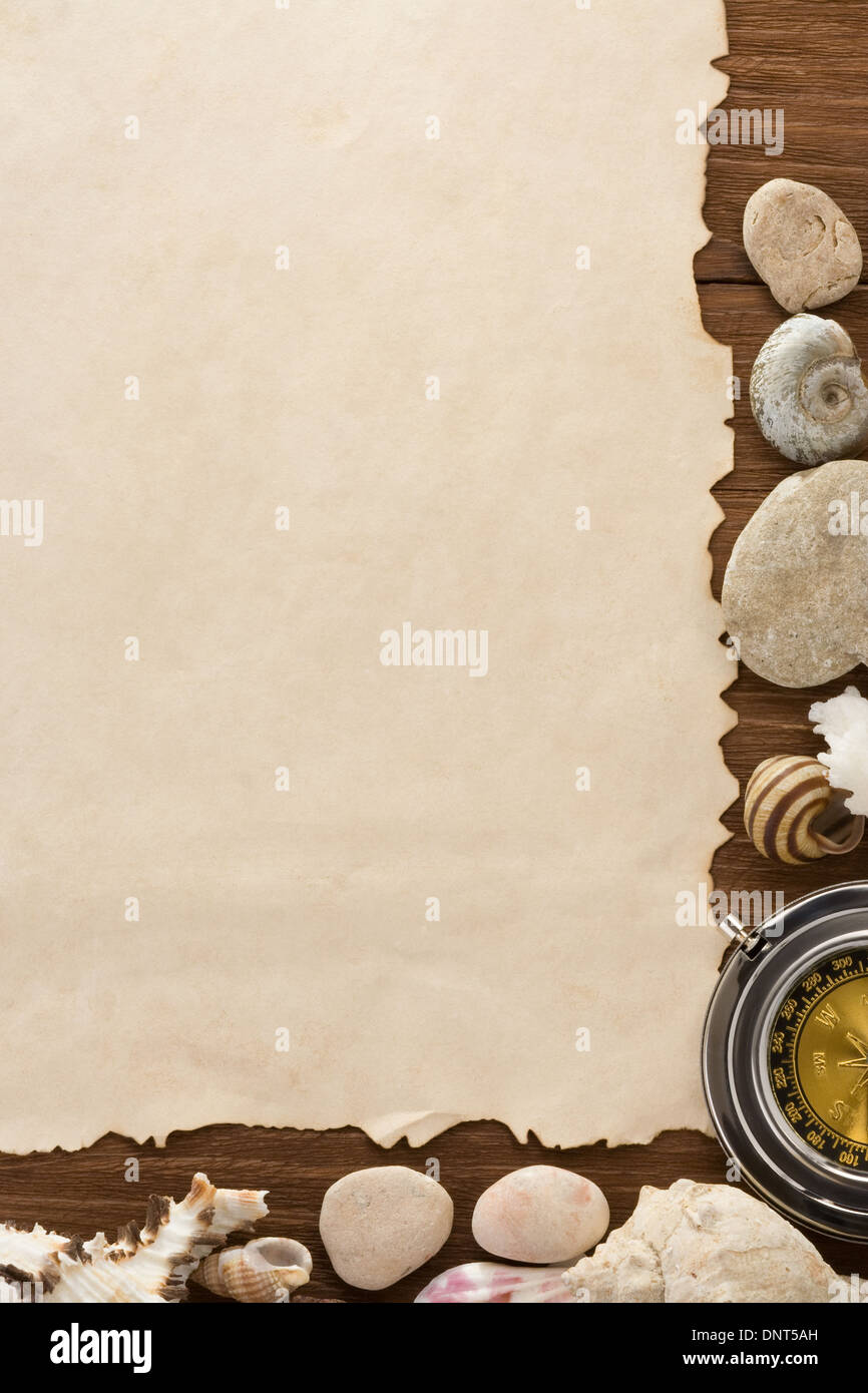 paper vintage background and compass on wood Stock Photo - Alamy