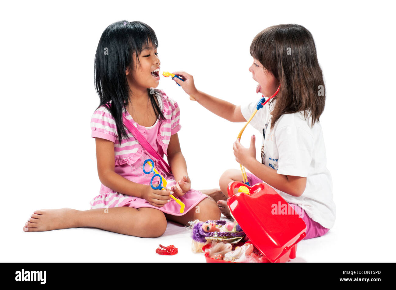 Children playing doctor and patient, portrait Stock Photo - Alamy