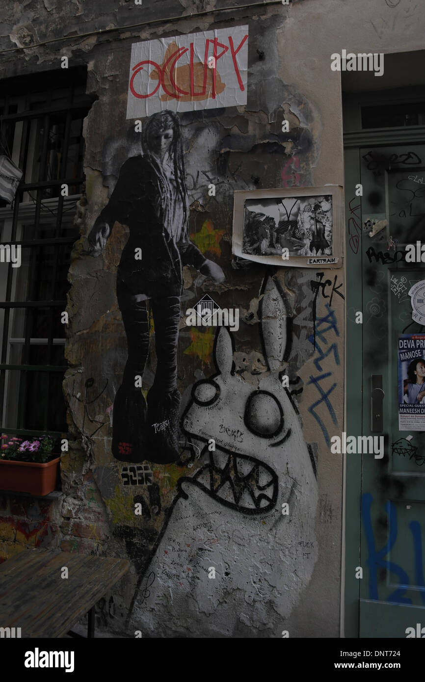 Courtyard wall portrait, graffiti scrawl, 'Knut' crazy bear head, SOBR ...