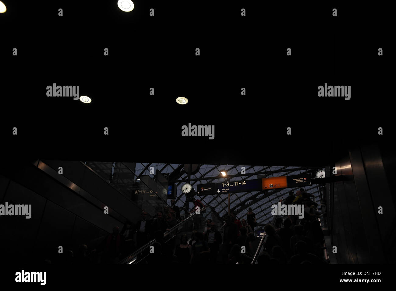 3 white circular electric lights dark ceiling foreground view hi-res ...