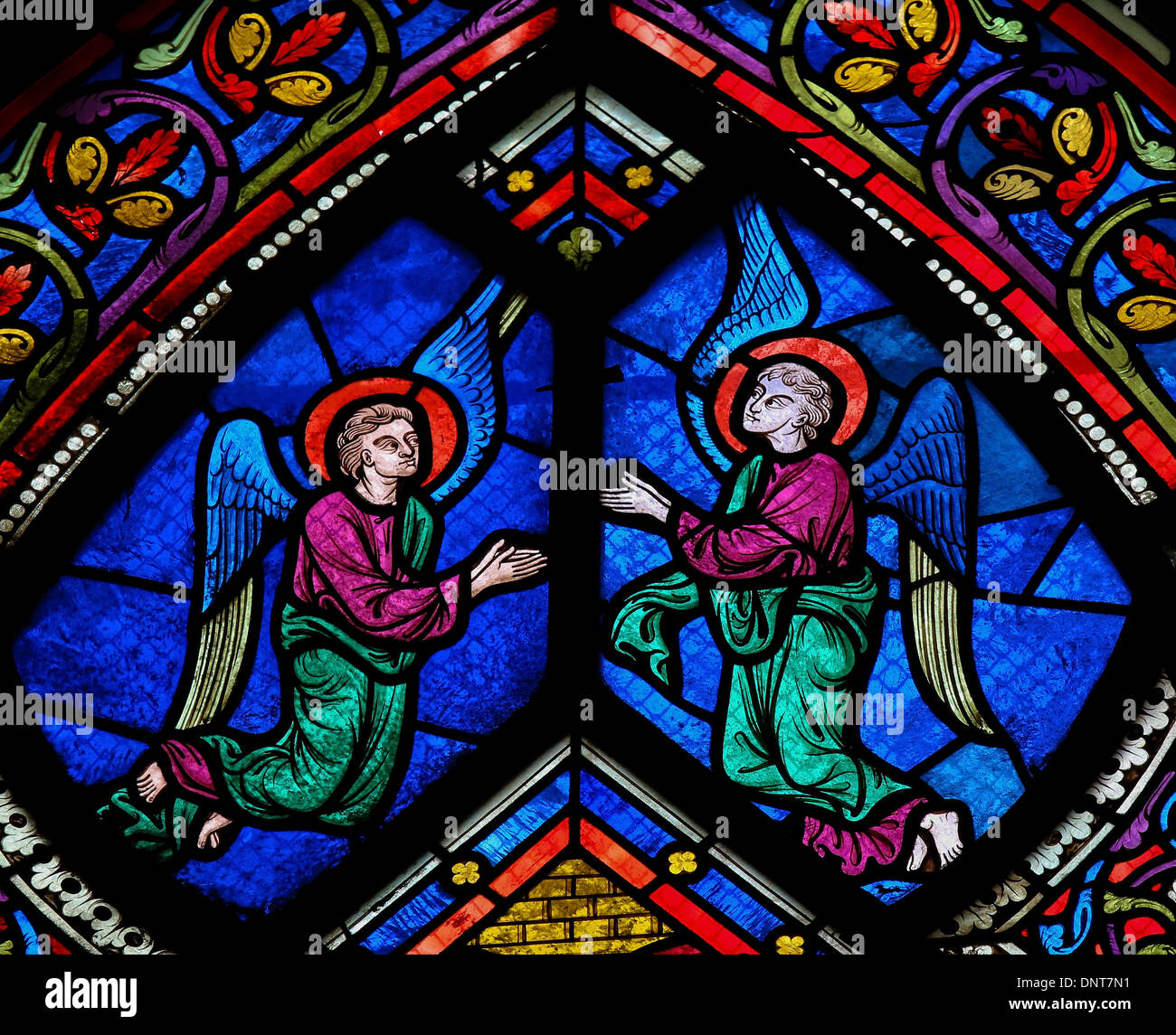Stained glass window depicting two angels in the cathedral of Bayeux ...
