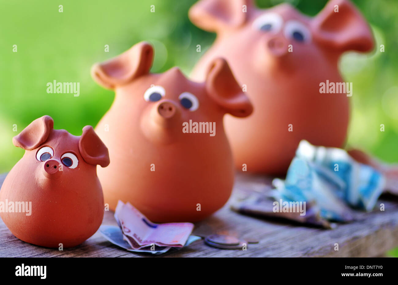 Three ceramic piggy banks Stock Photo - Alamy