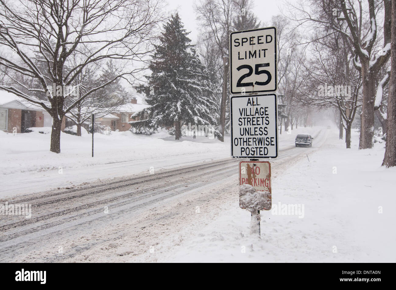 Chicago, Illinois, 5 January 2014. Snow covered traffic signs in the ...