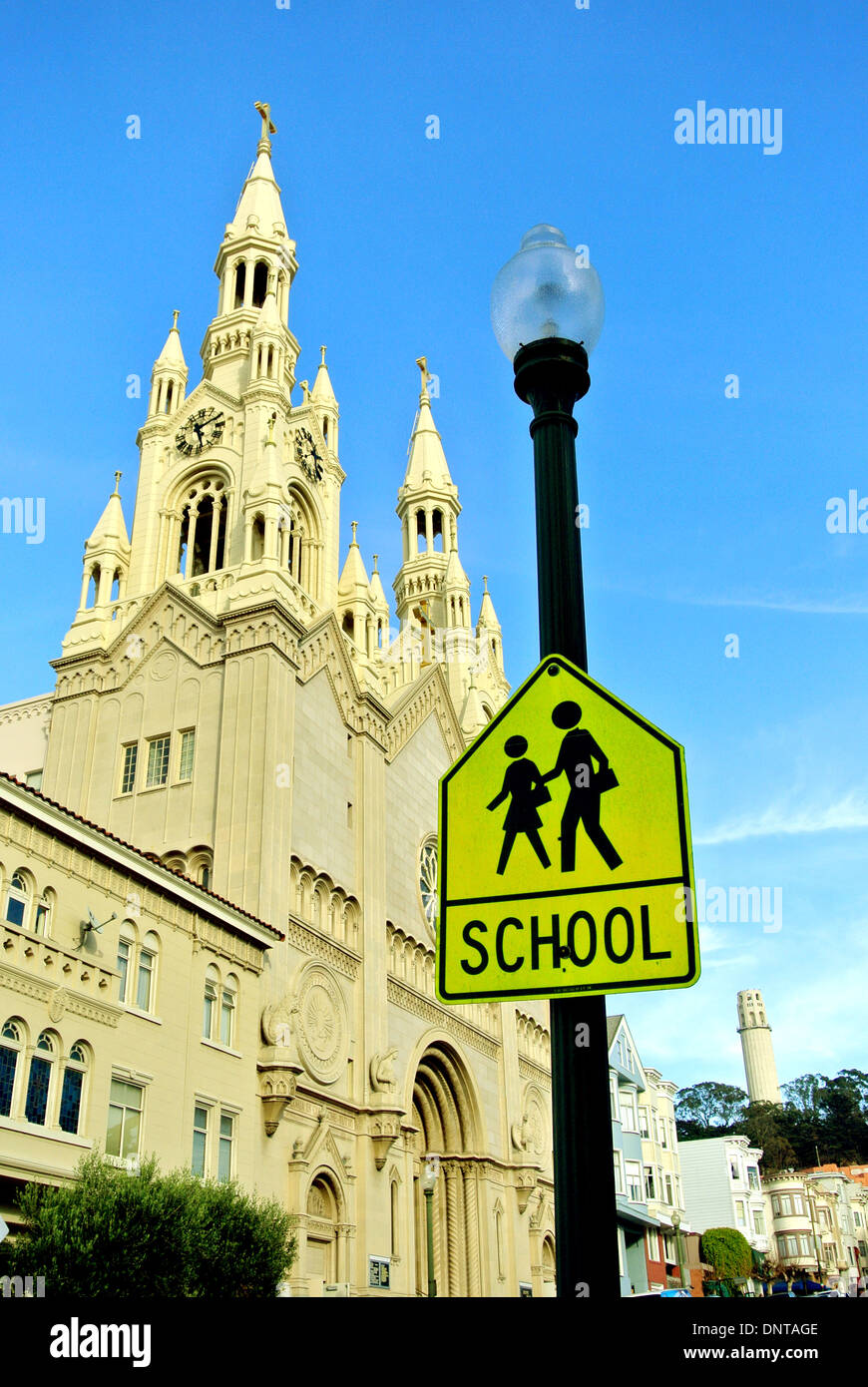 school crossing sign on street in front of saints peter and paul ...