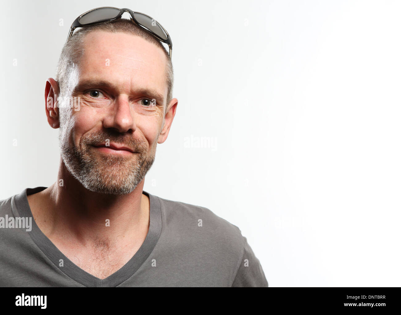Man looking camera smile head hi-res stock photography and images - Alamy