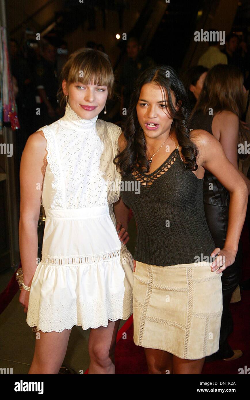 Mar. 12, 2002 - Milla Jovovich + Michelle Rodriguez.Premiere RESIDENT ...