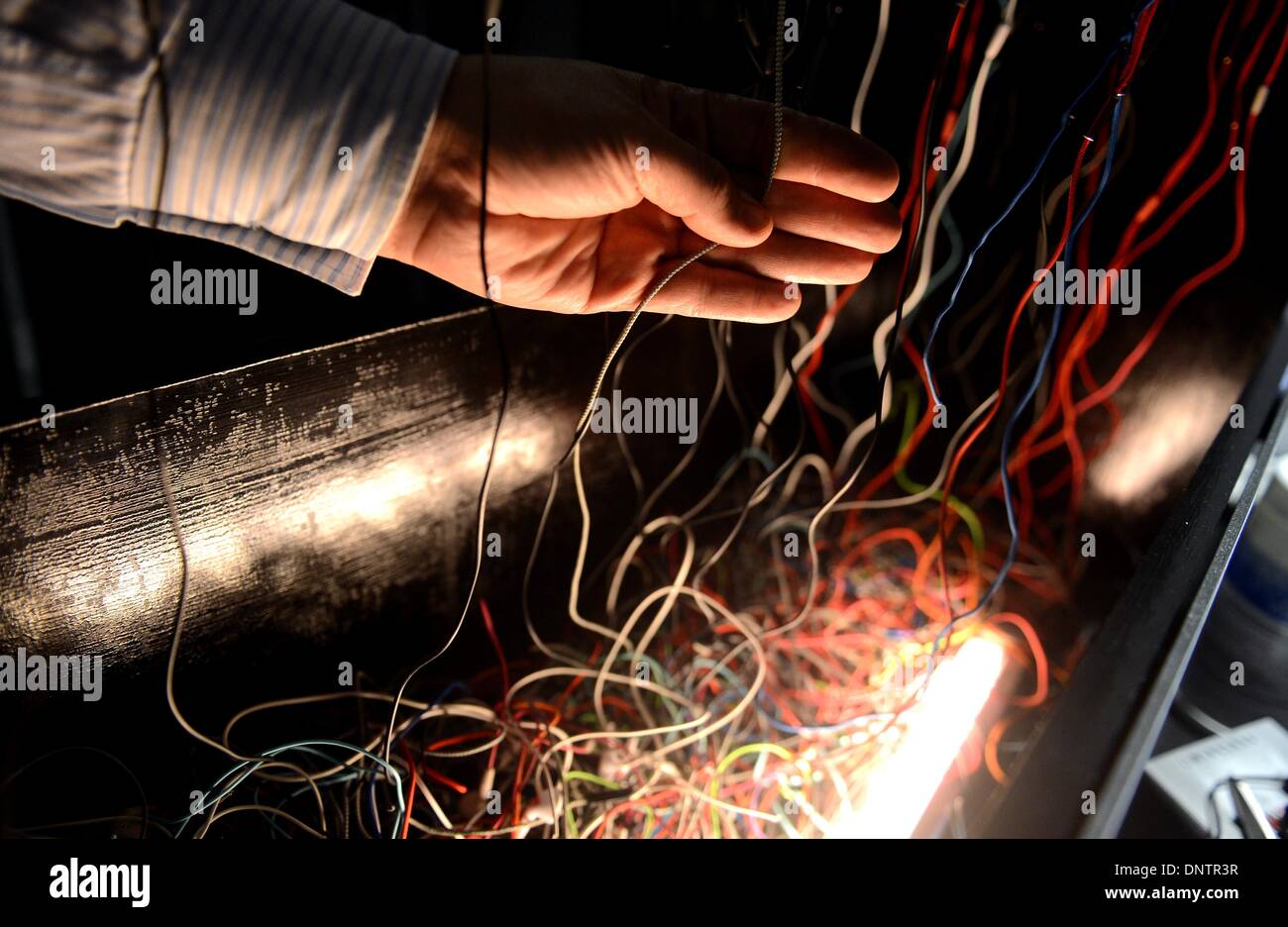 Las Vegas, USA. 05th Jan, 2014. Cables hang at a booth during the event ...