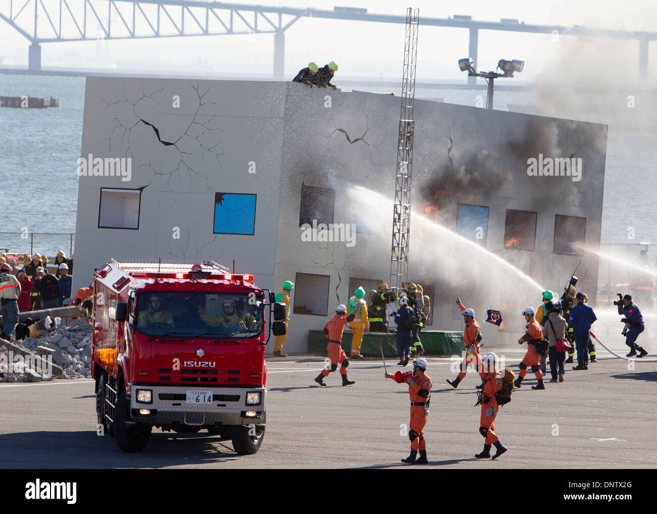 Tokyo, Japan. 6th Jan, 2014. Firefighters perform a demonstration on ...