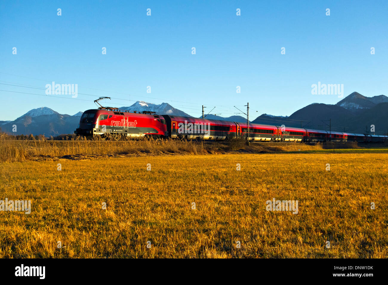 Railjet passenger train in Bavarian landscape, Chiemgau, Upper Bavaria ...
