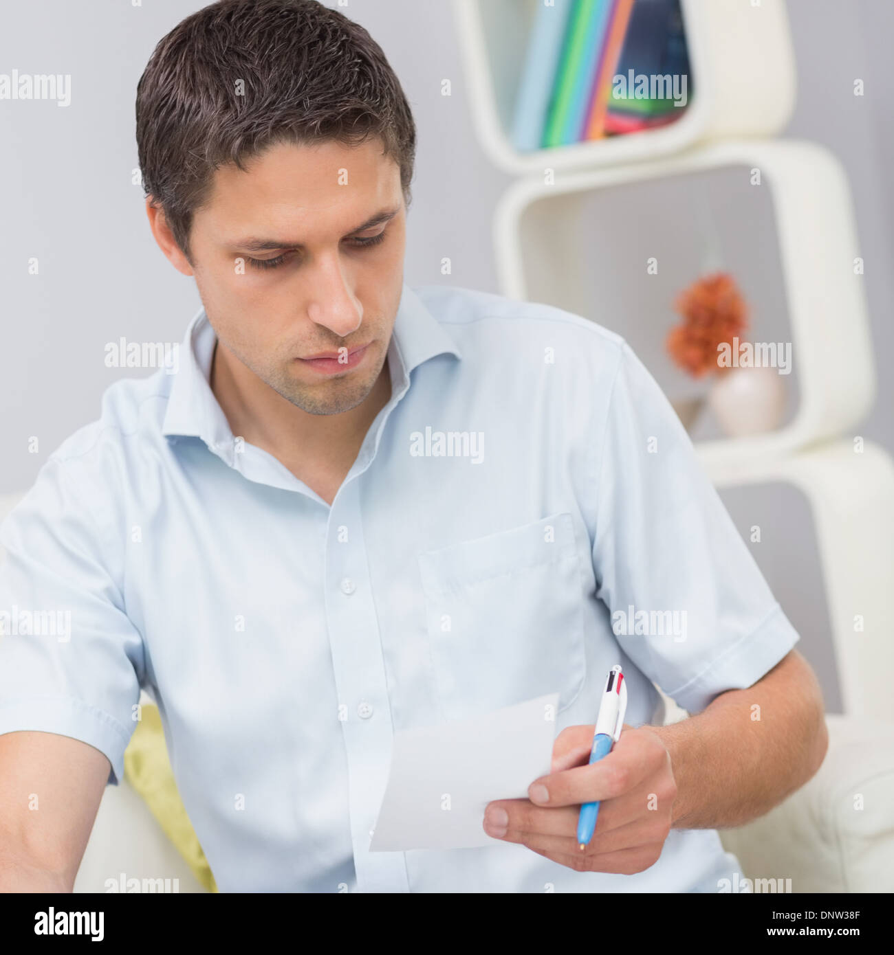 Stressed young man credit hi-res stock photography and images - Alamy