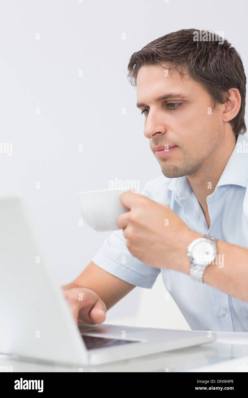 Man holding teacup hi-res stock photography and images - Alamy