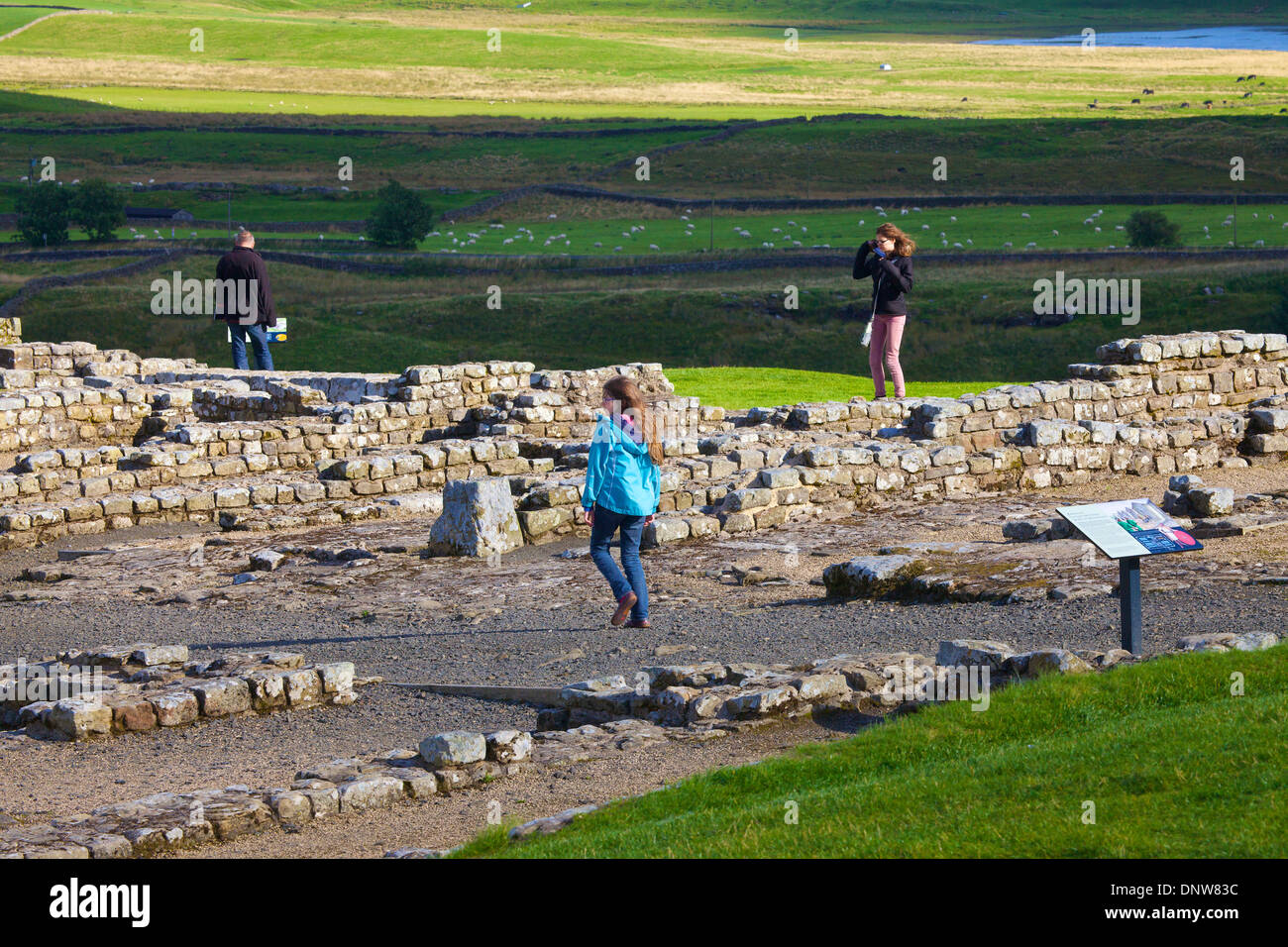 Tourists at Housteads Roman Fort on Hadrian’s Wall National Trail ...