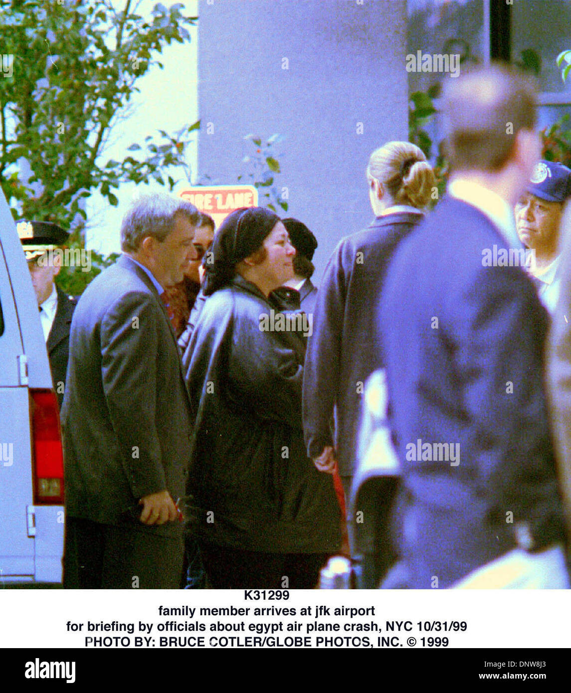 Oct. 31, 1999 - K31299BC 10/31/99.Family member arrives at JFK airport ...