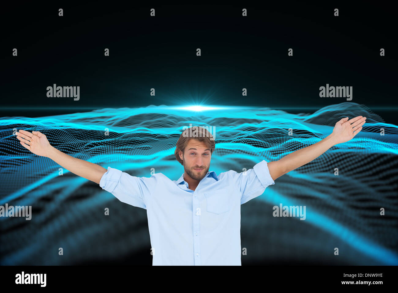 Composite image of handsome man raising hands Stock Photo - Alamy