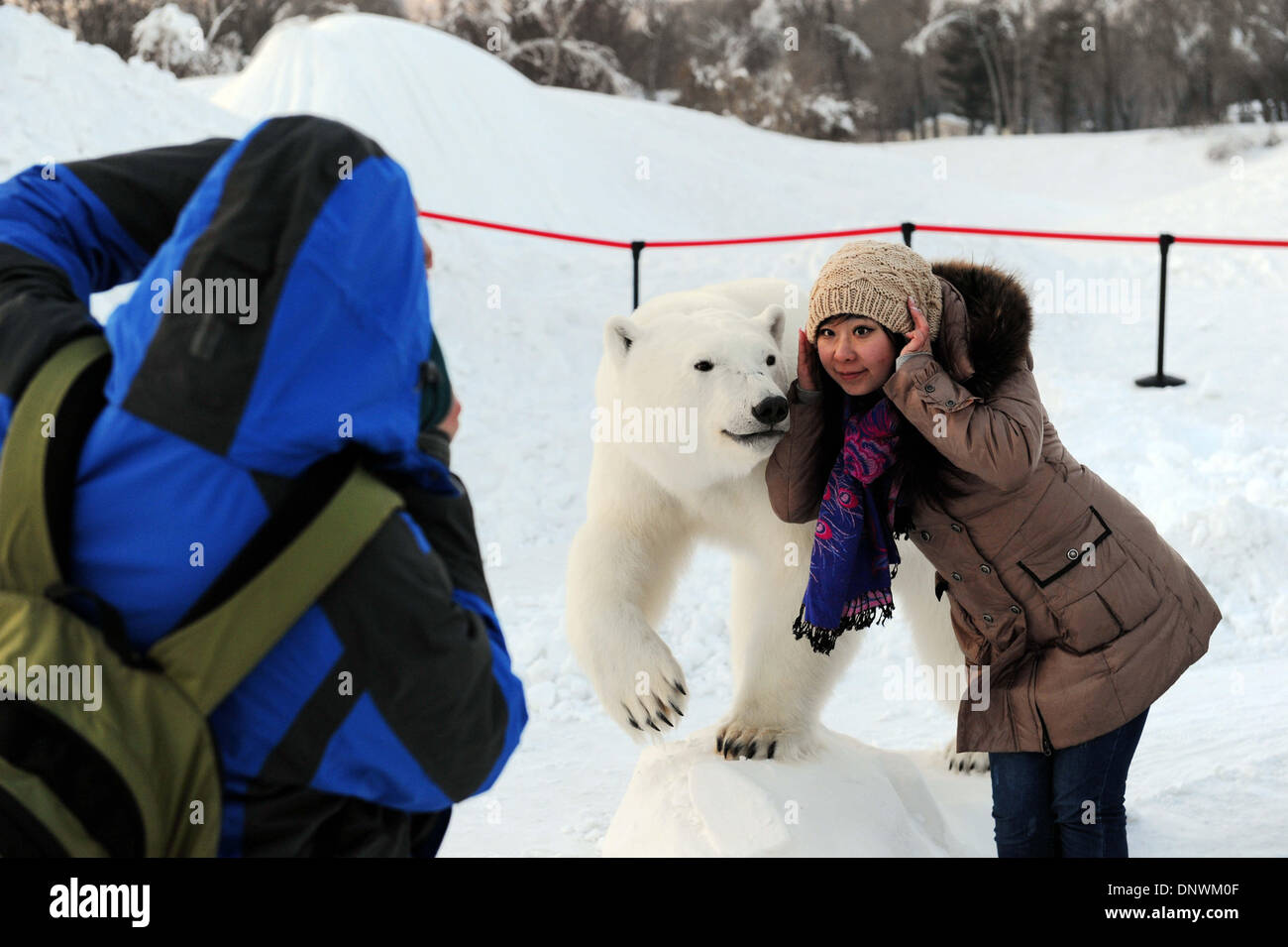 Harbin, China's Heilongjiang Province. 6th Jan, 2014. A woman poses for ...