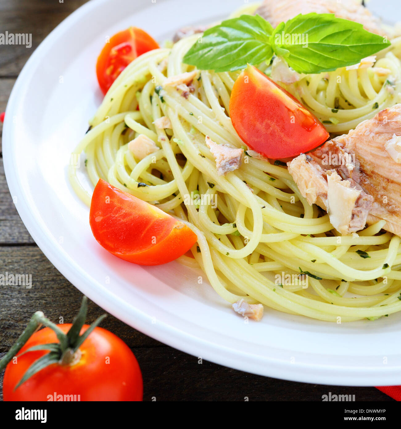 spaghetti with fish and vegetables, food closeup Stock Photo - Alamy