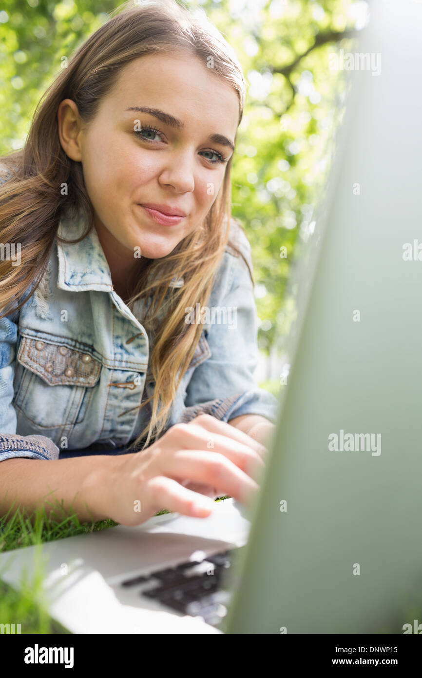 Smiling student laptop using hi-res stock photography and images - Alamy