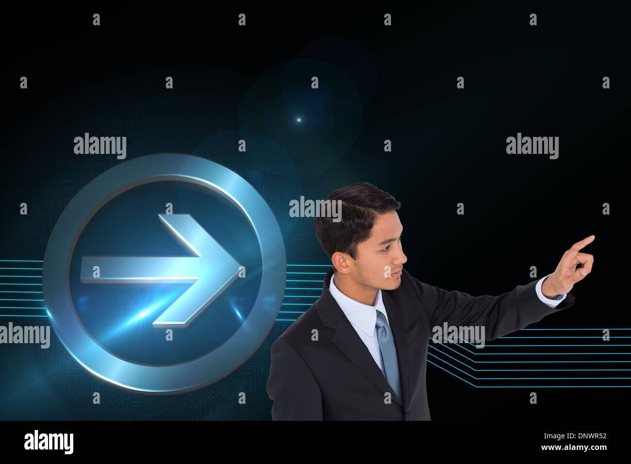 Composite image of stern asian businessman pointing Stock Photo - Alamy