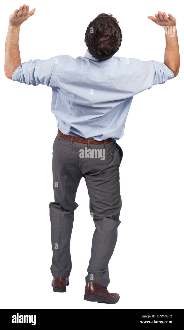 Businessman posing with arms raised Stock Photo - Alamy