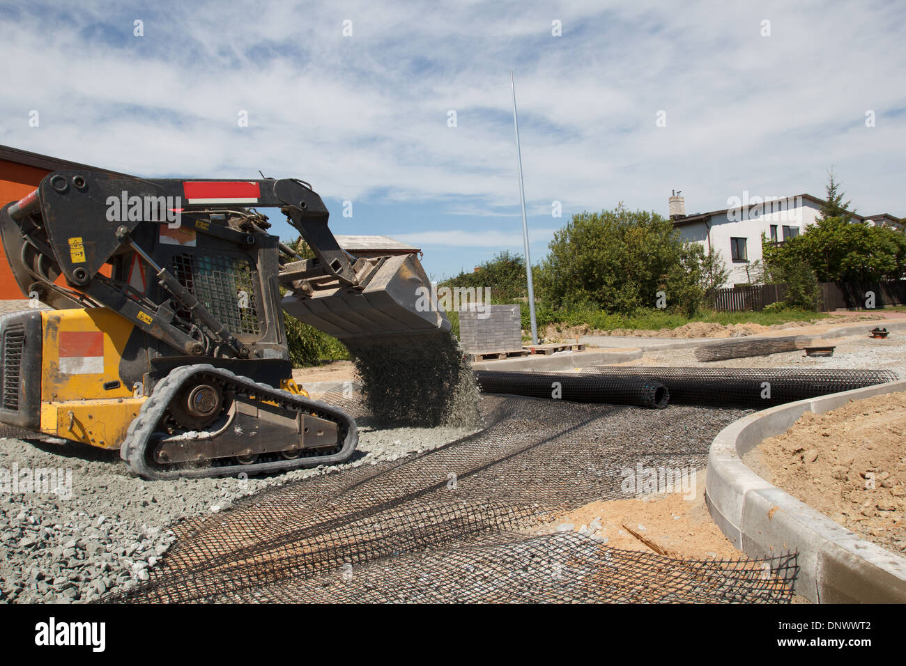 Construction of a new street in suburban district Stock Photo - Alamy