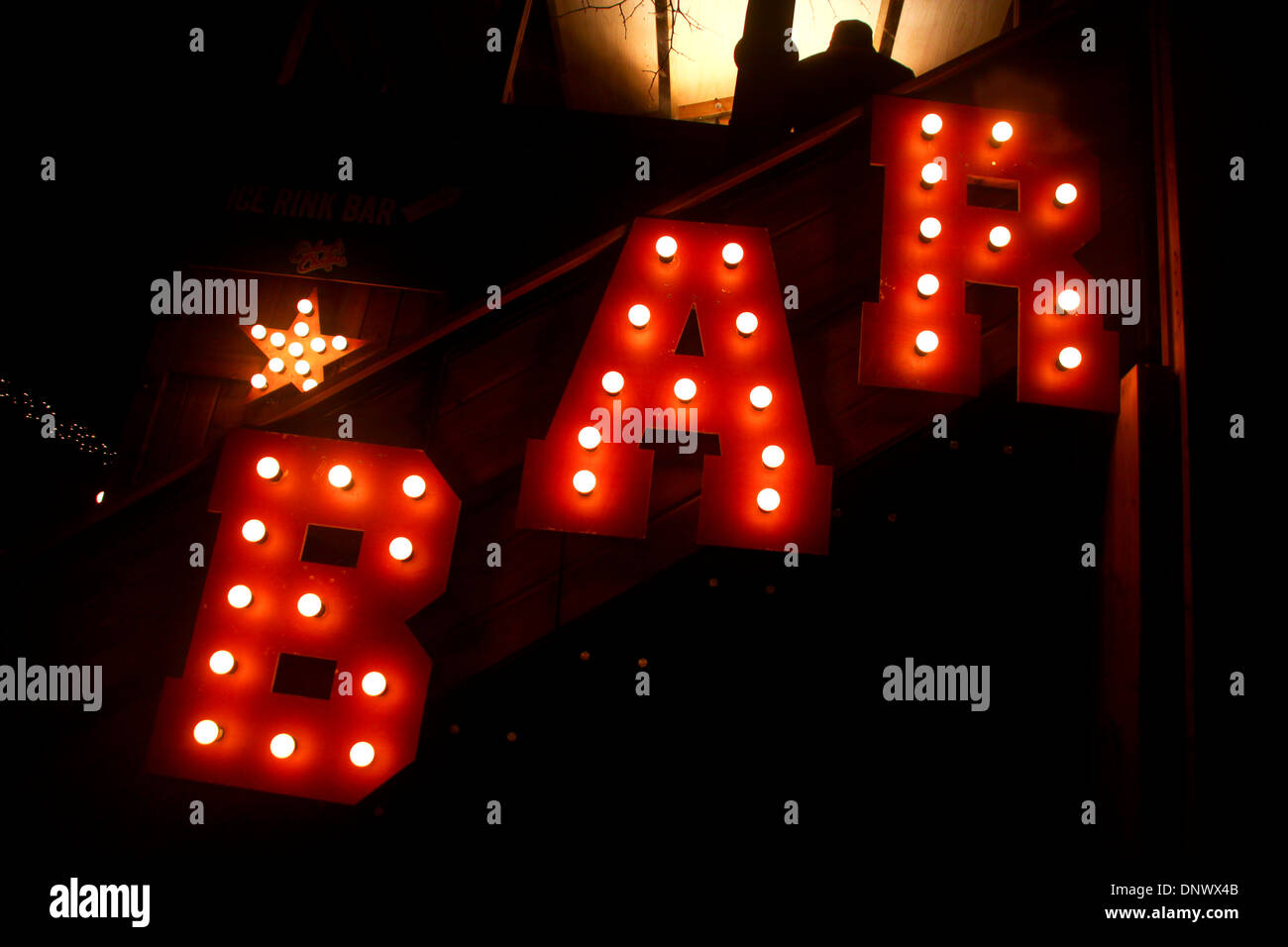Illuminated Bar sign Stock Photo - Alamy