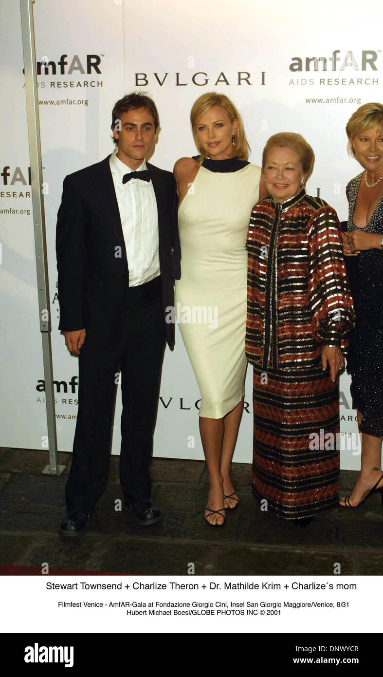 Aug. 31, 2001 - Stewart Townsend + Charlize Theron + Dr. Mathilde Krim ...