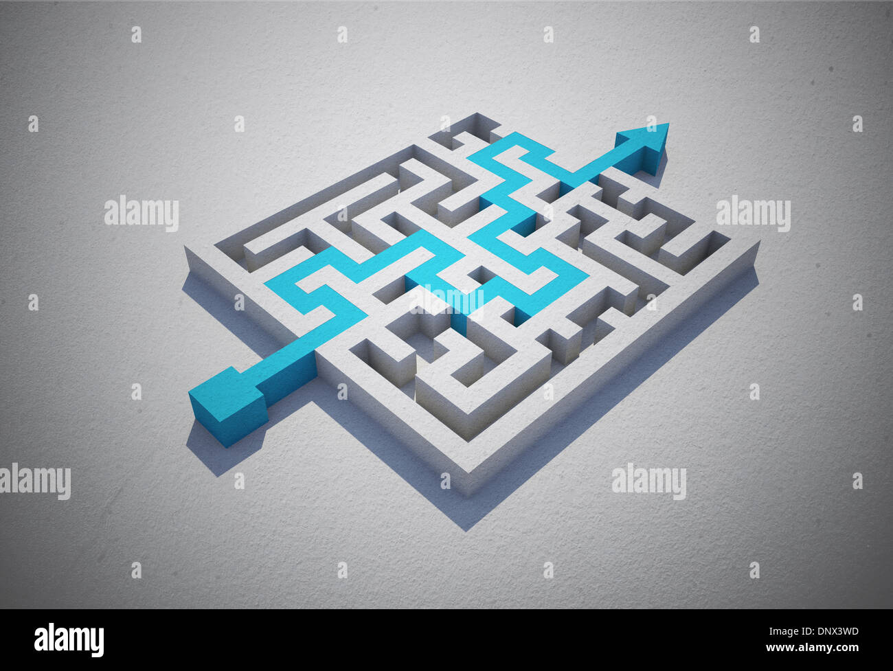 Blue arrow solving puzzle Stock Photo - Alamy