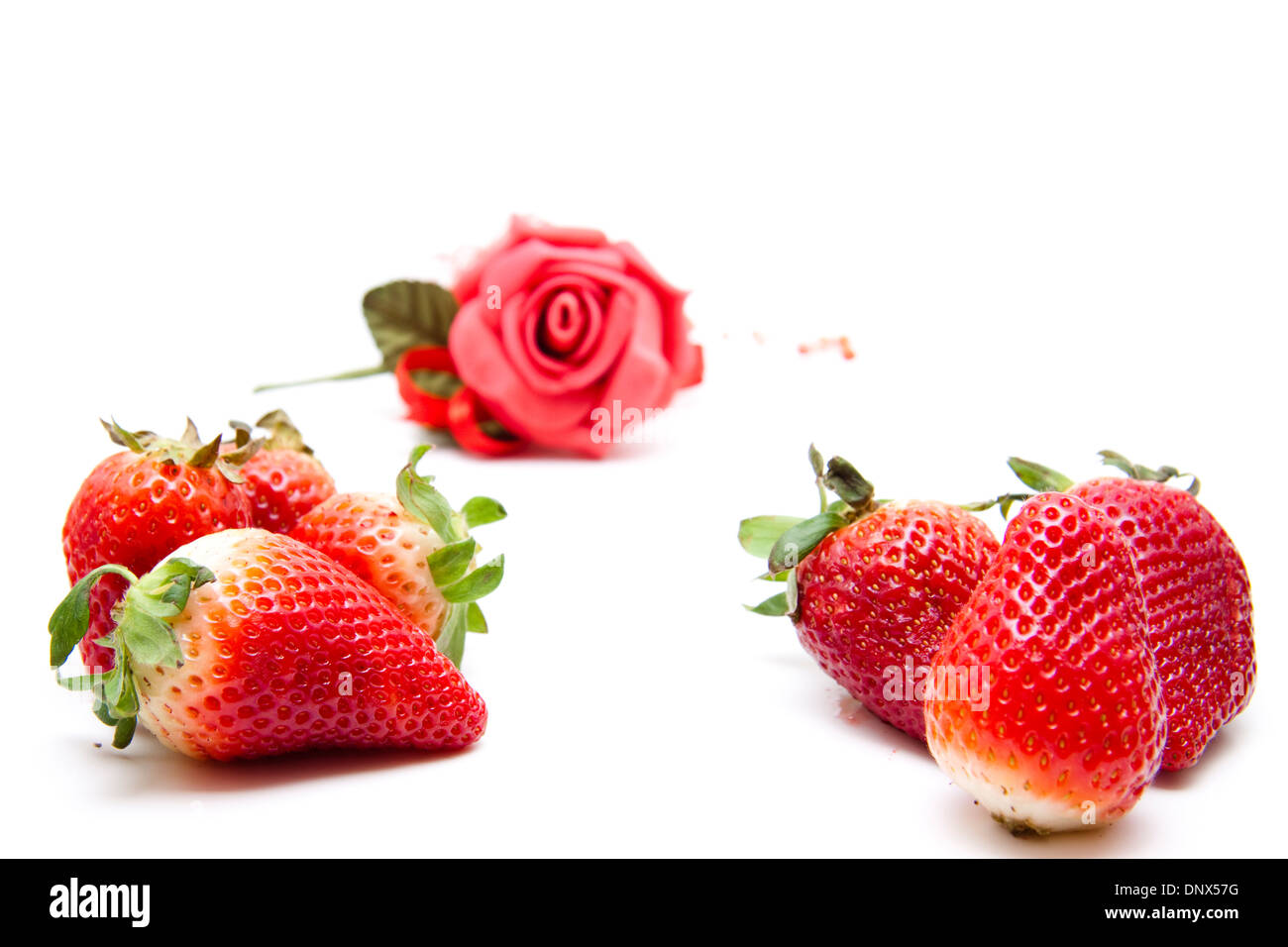 Fresh strawberries with rose Stock Photo - Alamy