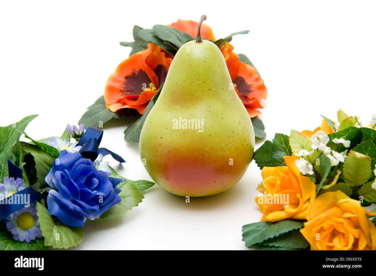 Pear with rose flower arrangement Stock Photo - Alamy