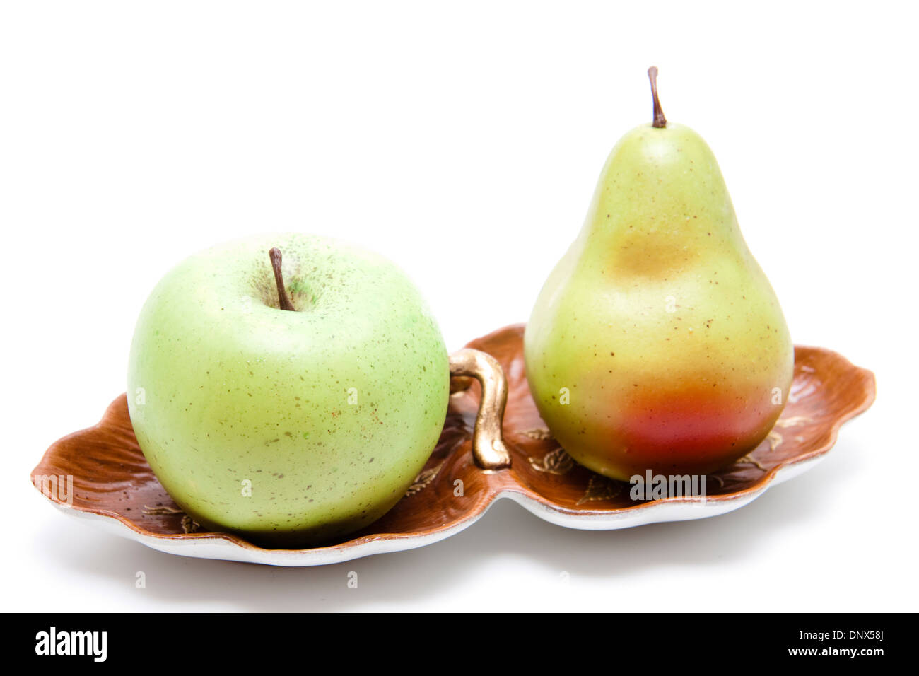 Plate tasty apple pear Cut Out Stock Images & Pictures - Alamy