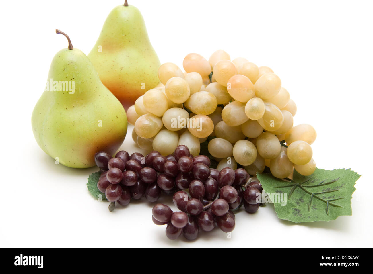 Pear with wine grapes Stock Photo - Alamy